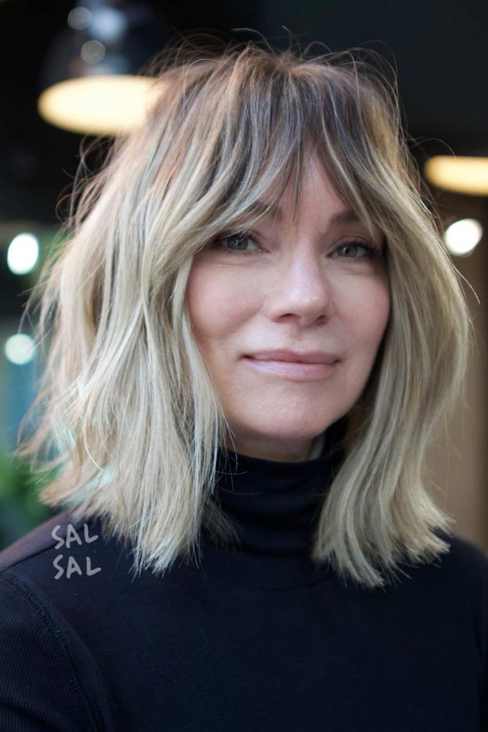 Upgrade Your Look: Medium Hairstyles with Bangs - Glaminati