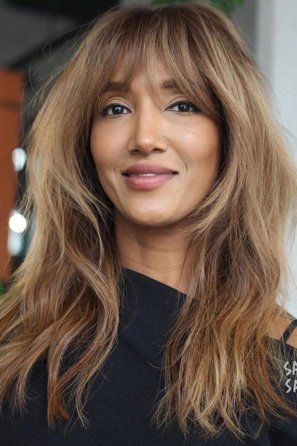 23 Best Layered Haircuts with Bangs for Every Style
