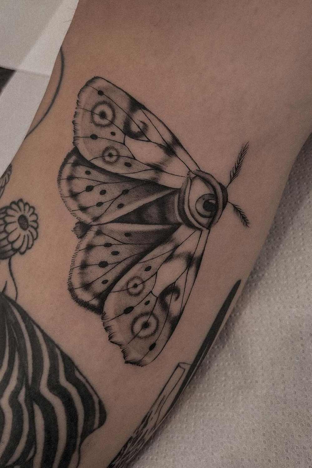 Otherworldly Beauty and Profound Symbolism of Moth Tattoo Trend