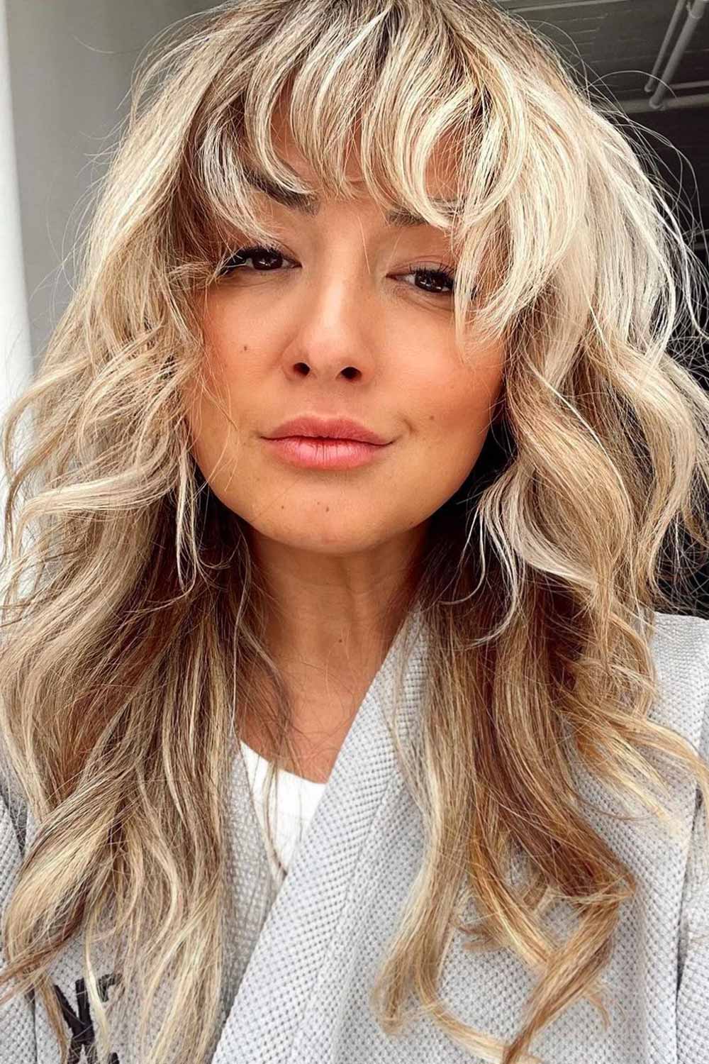 The Ultimate Sass and Versatility of Wispy Bangs